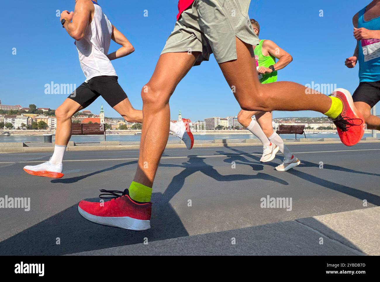 group man athlete running marathon in embankment river Stock Photo - Alamy