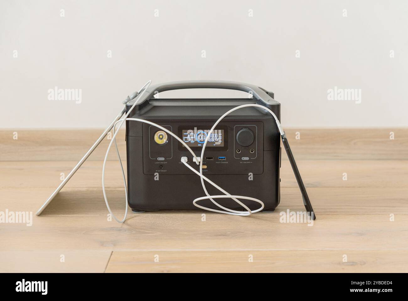 Uninterruptible power supply source. Portable power station charching ...