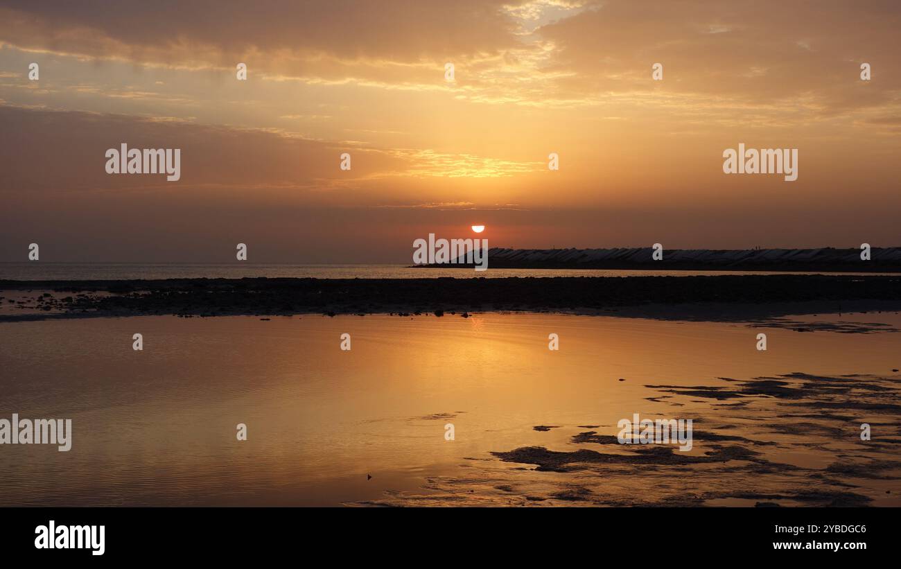 October 2024. Sunrise in Middle East, Maboulah Beach Stock Photo - Alamy
