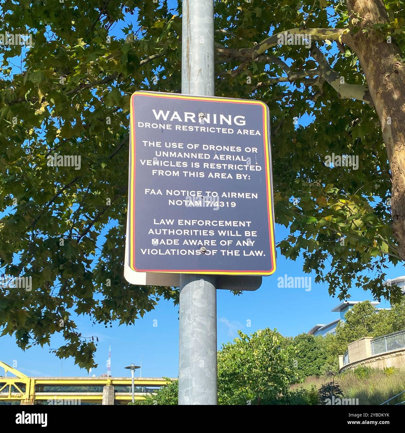A sign warns about the prohibition of drone usage in this waterfront ...