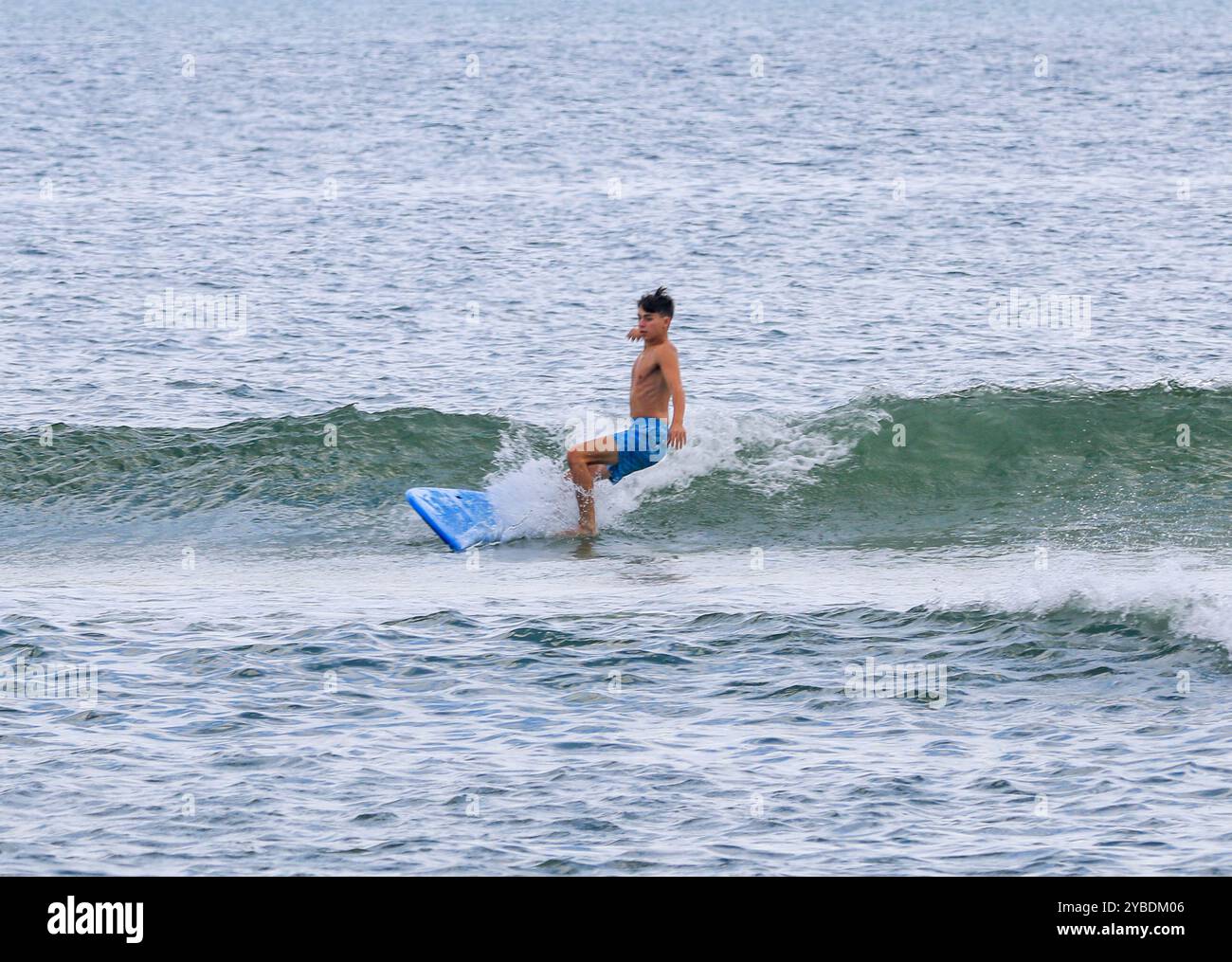 Gilgo Beach, New York, USA - 2 September 2024: Young man falling off of ...