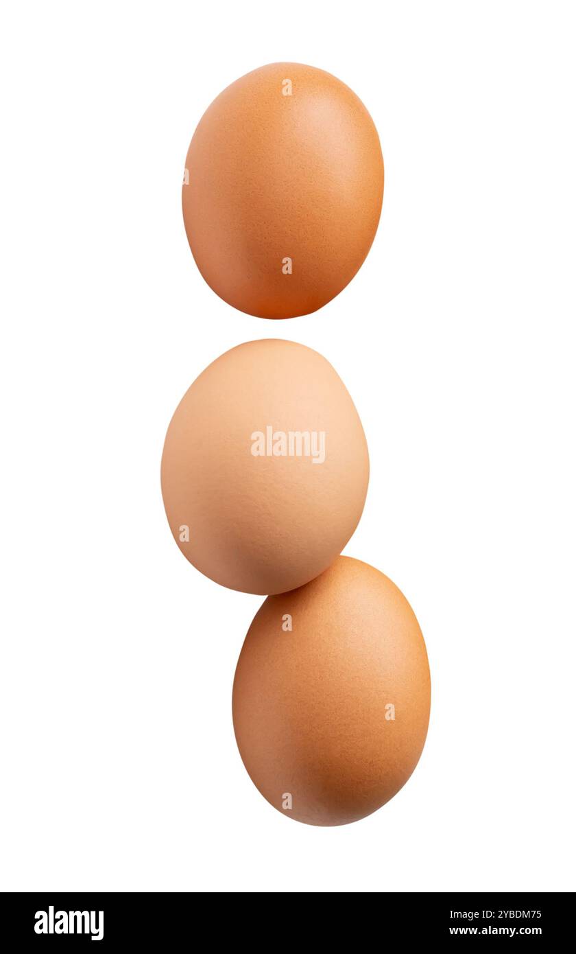 Top view set of three fresh brown chicken eggs is isolated on white ...