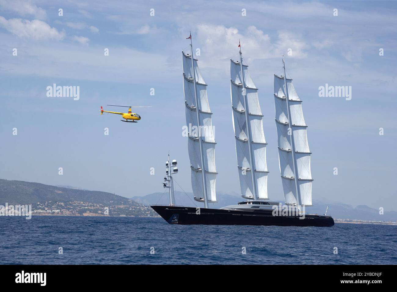 88m Superyacht Maltese Falcon sailing in a regatta, with a Robinson 44 ...