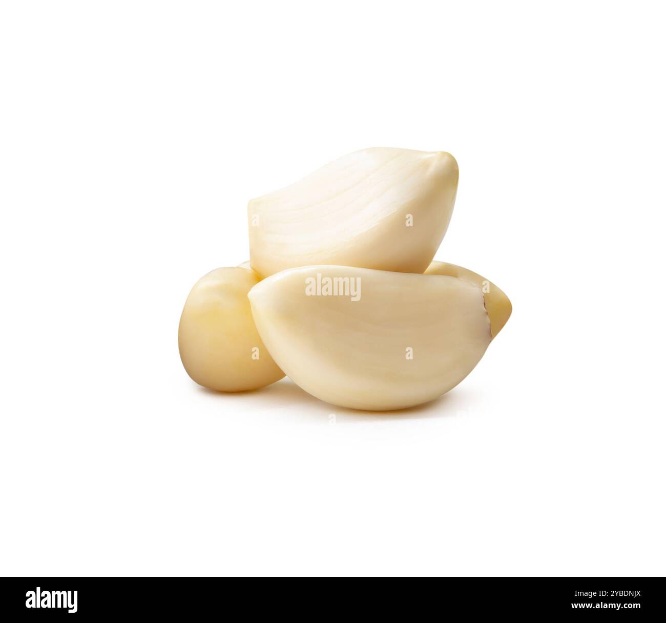 Side view of peeled garlic cloves in stack are isolated on white ...