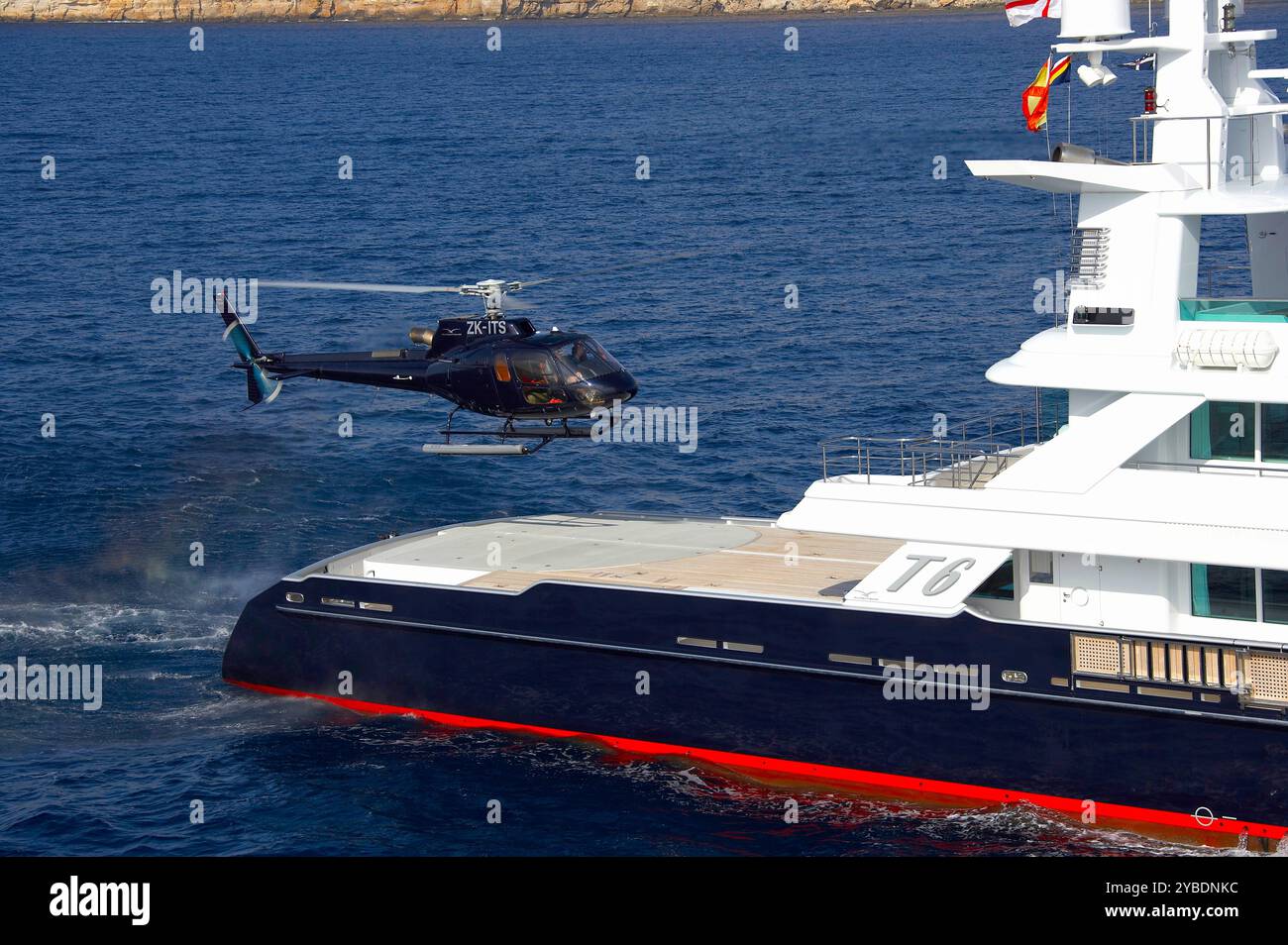 Helicopter Landing on the Helideck of Superyacht T6 while moving at sea ...