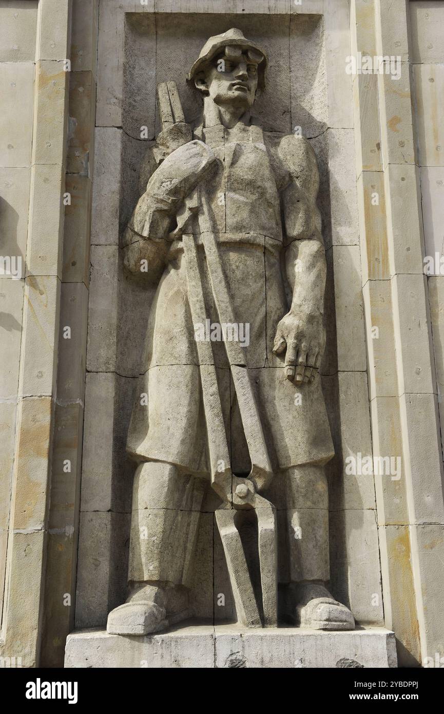 Socialist relief, Constitution Square, Warsaw, Poland. Post-war Social ...