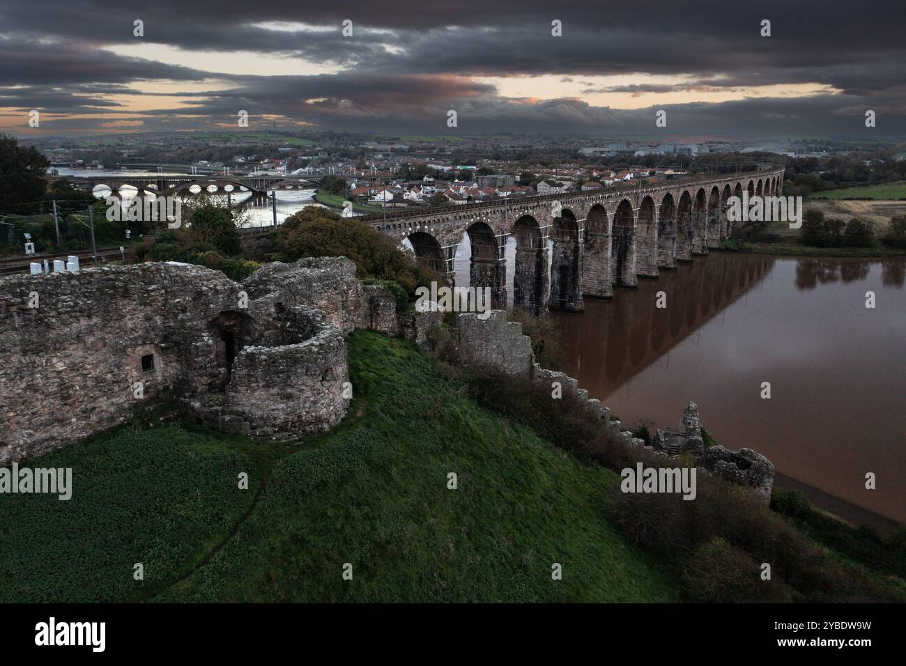 The remains of Berwick Castle and the Royal Border Bridge Stock Photo ...