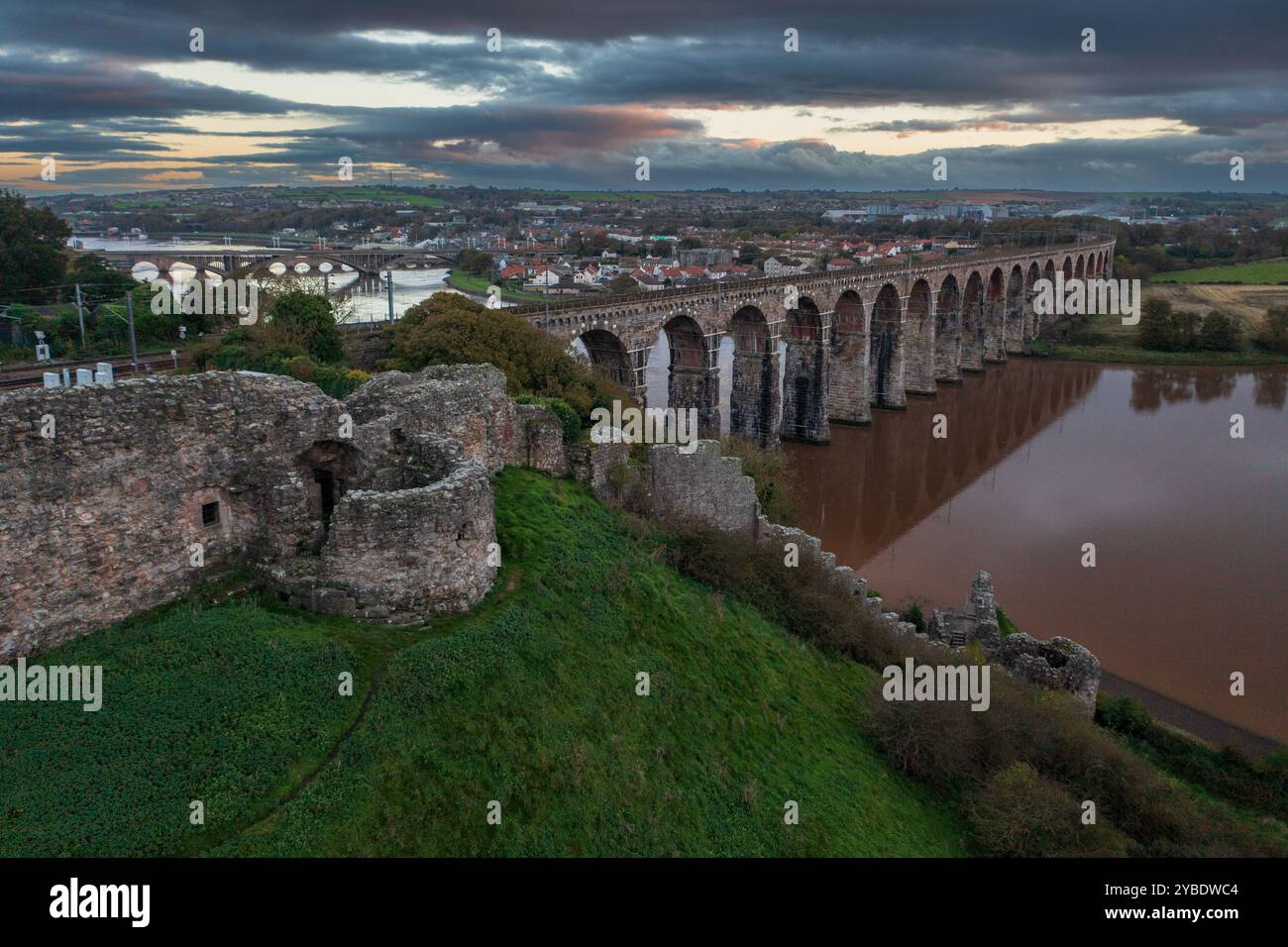 The remains of Berwick Castle and the Royal Border Bridge Stock Photo ...