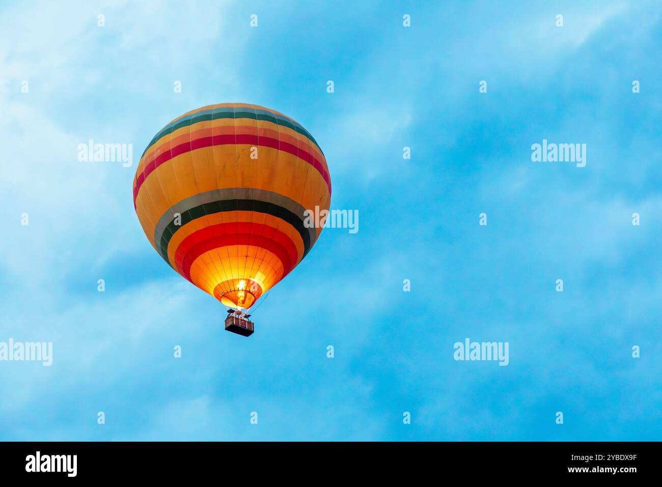 Tourist ariel balloon in flight against a blue sky, Marai Mara, Kenya ...