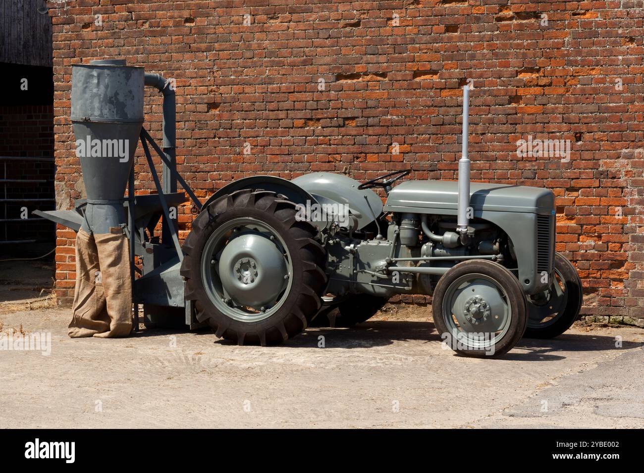 Ferguson TEF tractor with Ferguson Hammer Mill implement attached for ...