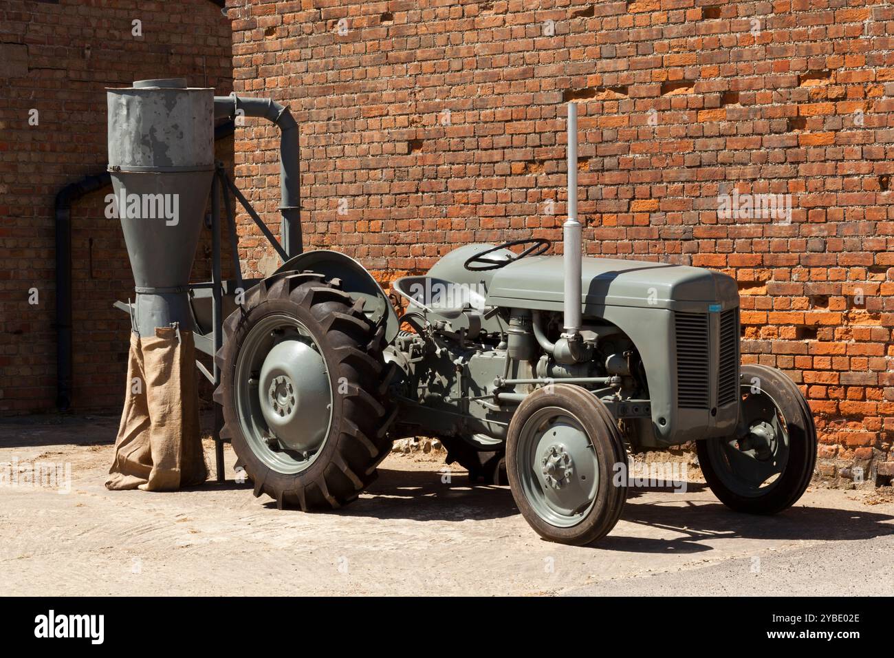 Ferguson TEF tractor with Ferguson Hammer Mill implement attached for ...