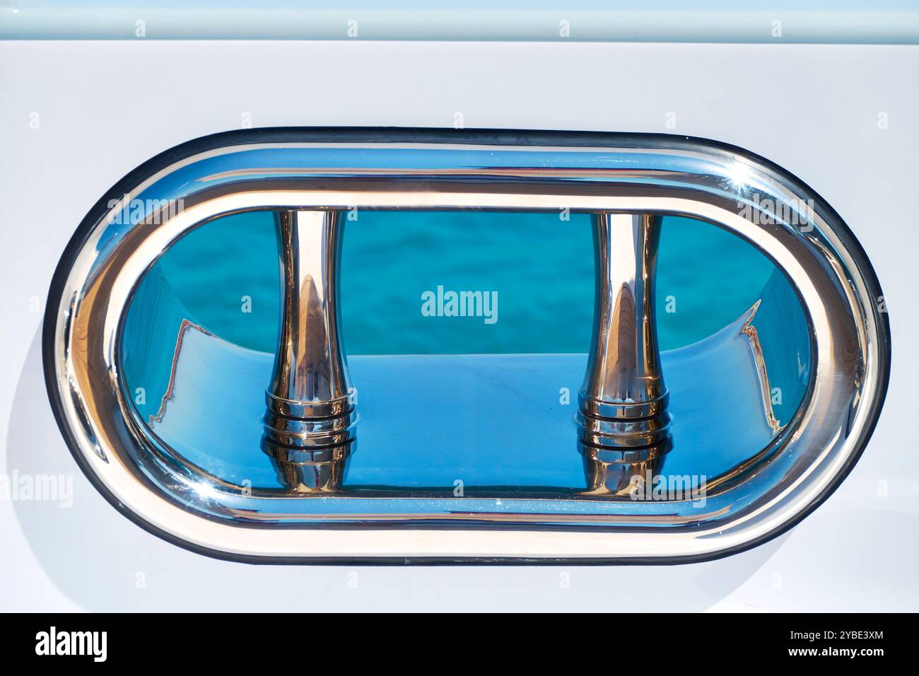 Yacht detail of stainless steel fairlead with side rollers on a large ...