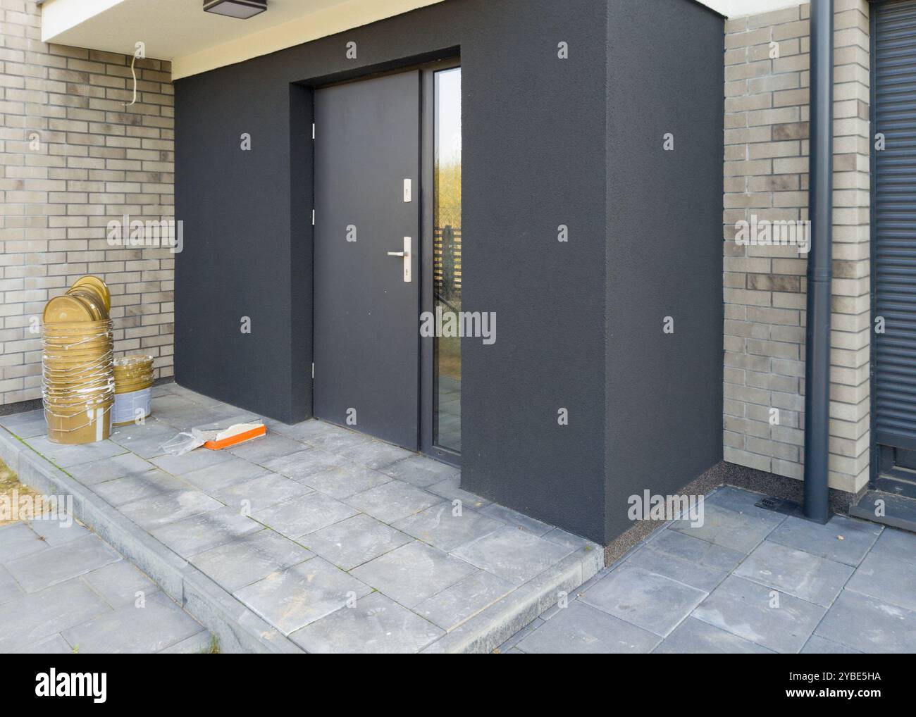 Modern house entrance under construction with tools Stock Photo - Alamy