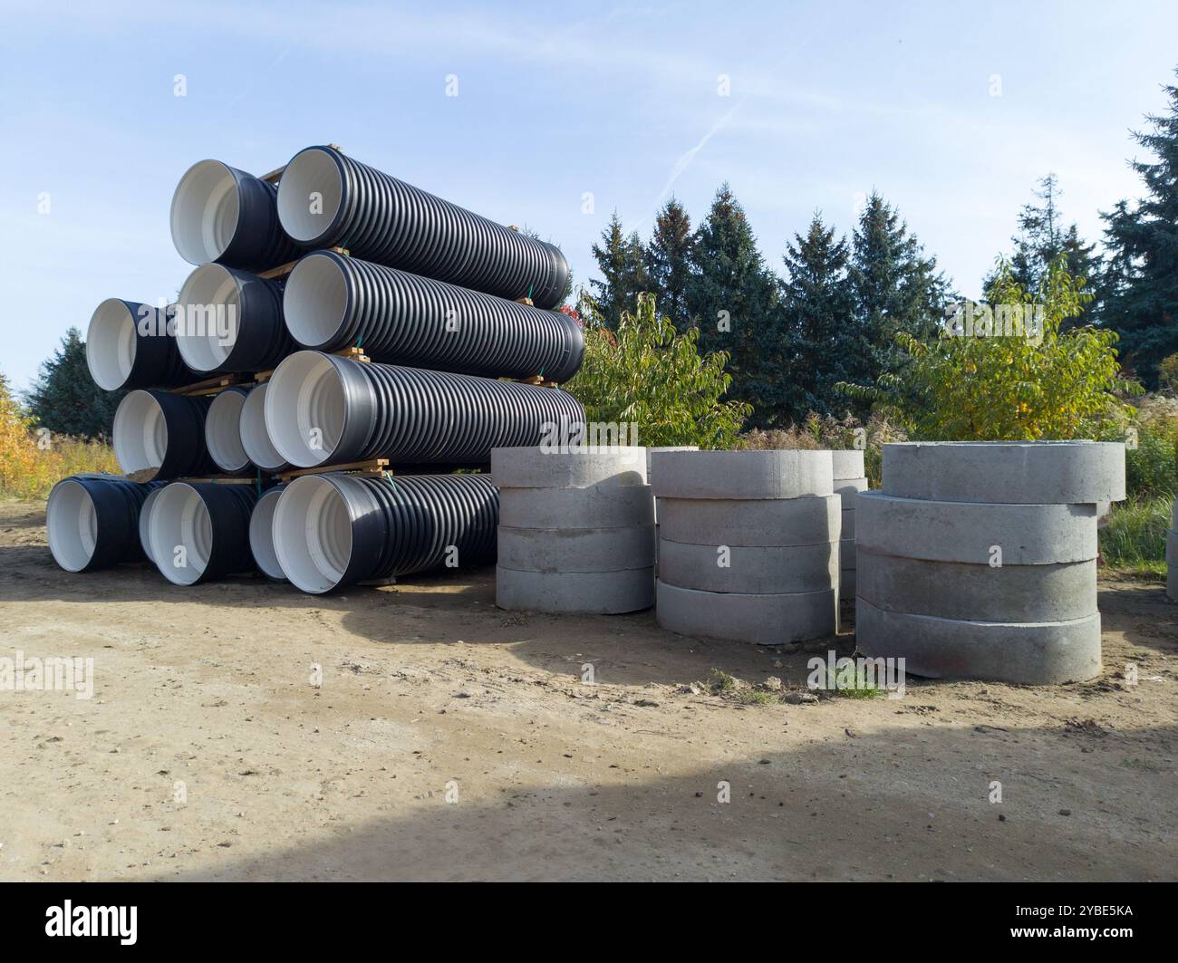 Large drainage pipes and concrete rings at construction site Stock ...