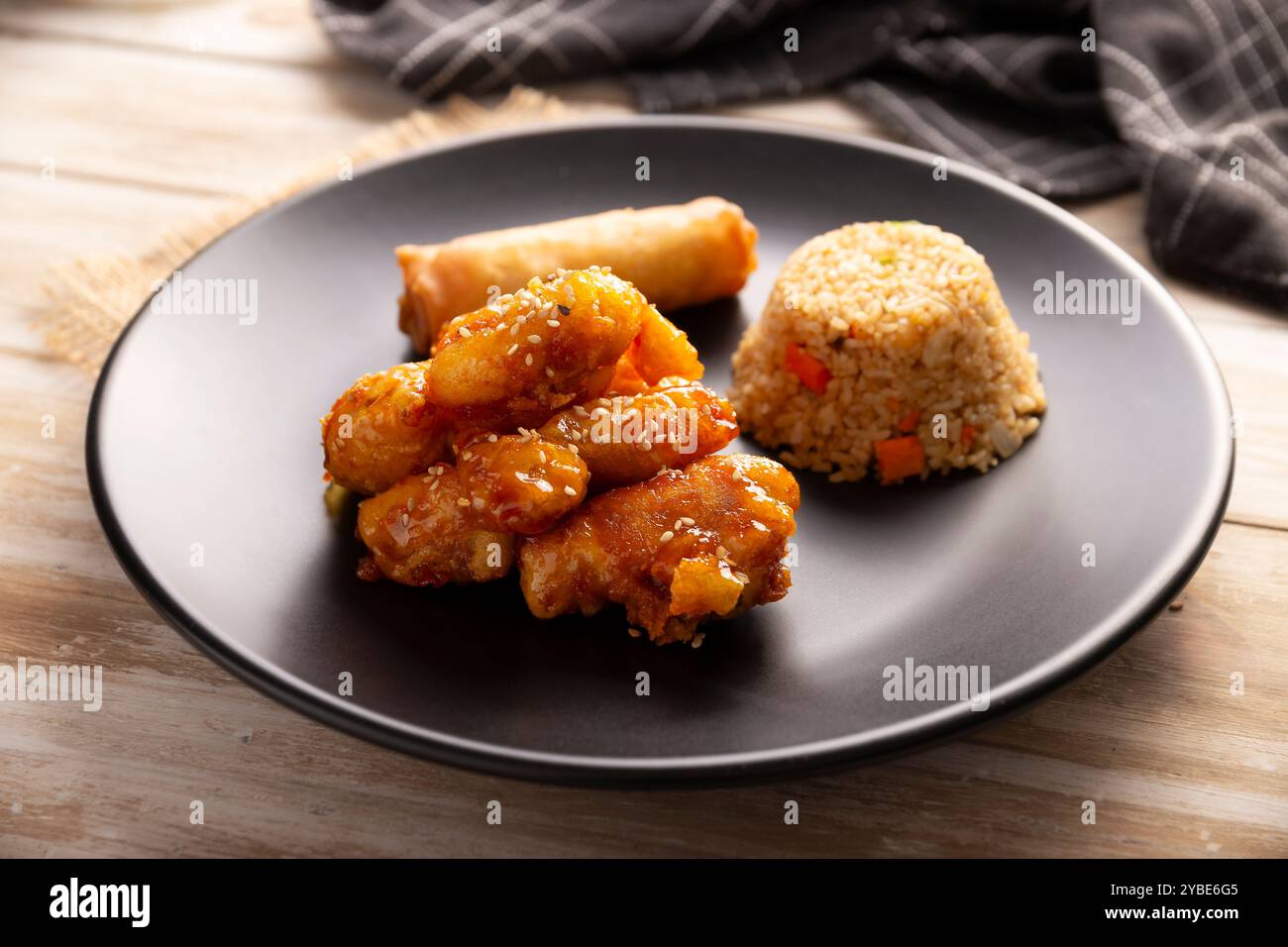 Sweet and sour chicken with fried rice and crispy spring roll, American ...