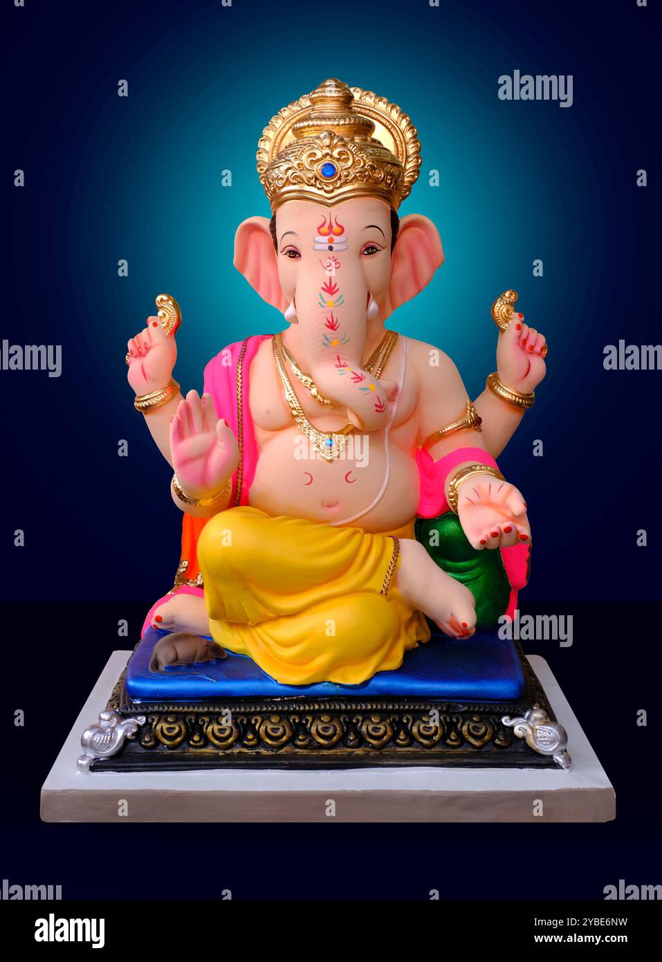 Hindu God Ganesha on Blue background, Ganesha Idol. Ganesh festival ...