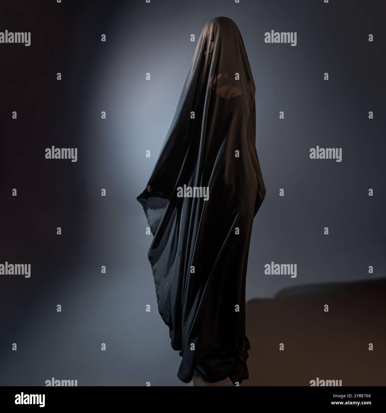 graceful young woman of Caucasian origin, wearing a long, black veil Stock Photo - Alamy