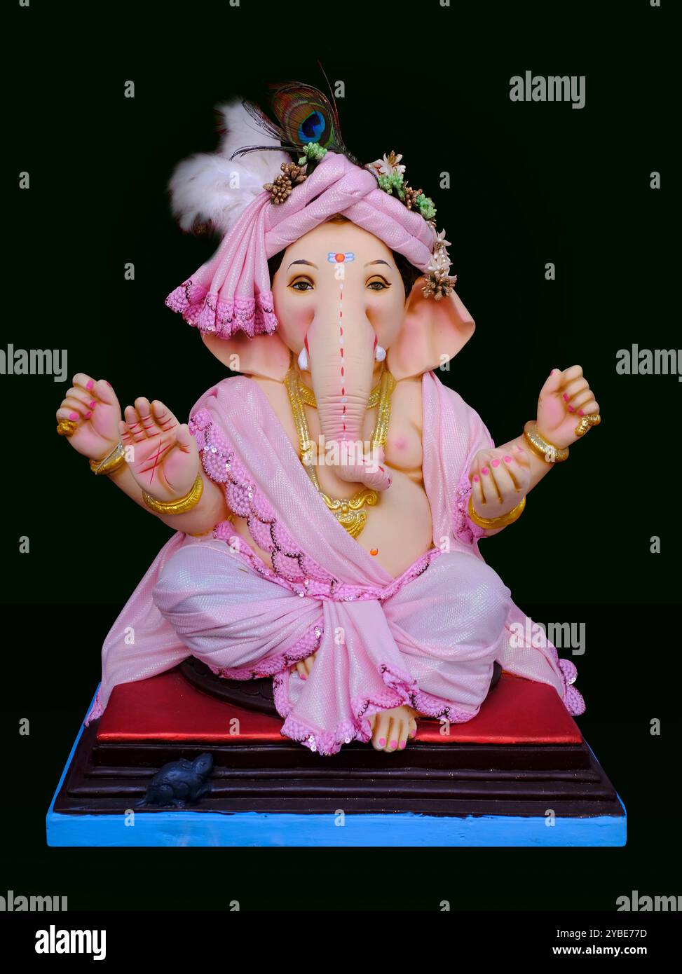 Hindu God Ganesha on Green background, Ganesha Idol. Ganesh festival ...