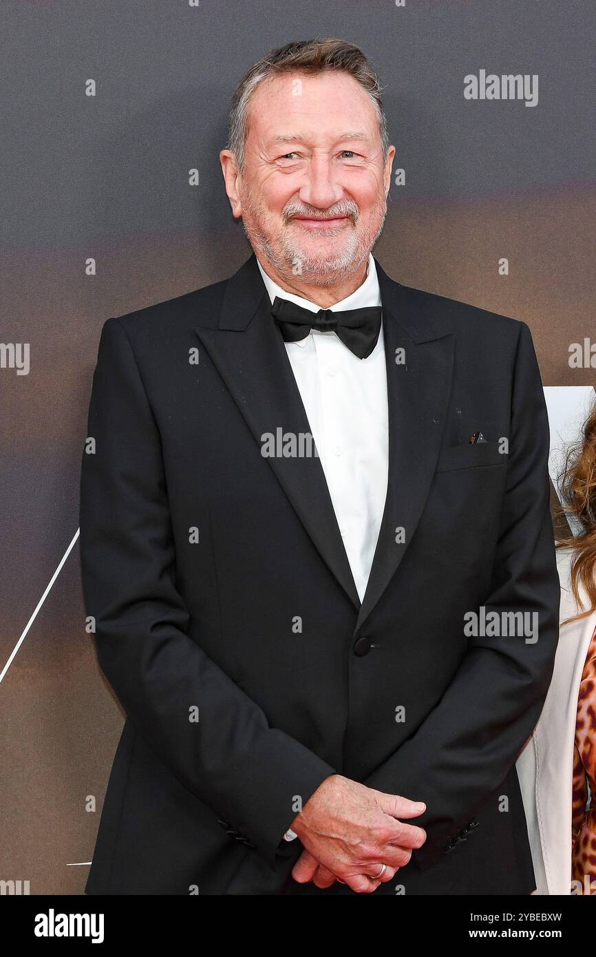 Steven Knight poses for photographers upon arrival at the premiere for ...