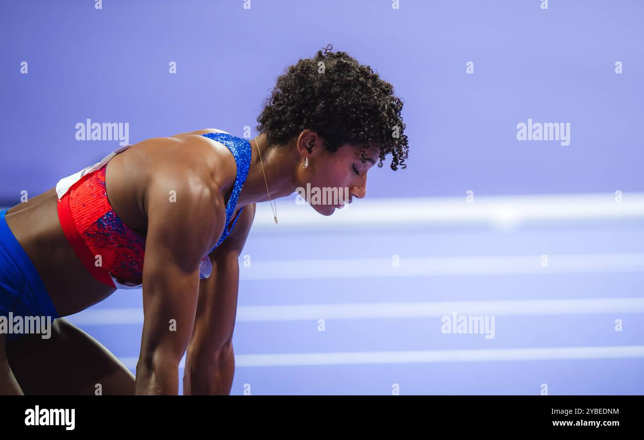 Anna Cockrell participating in the 400 meters hurdles at the Paris 2024 ...
