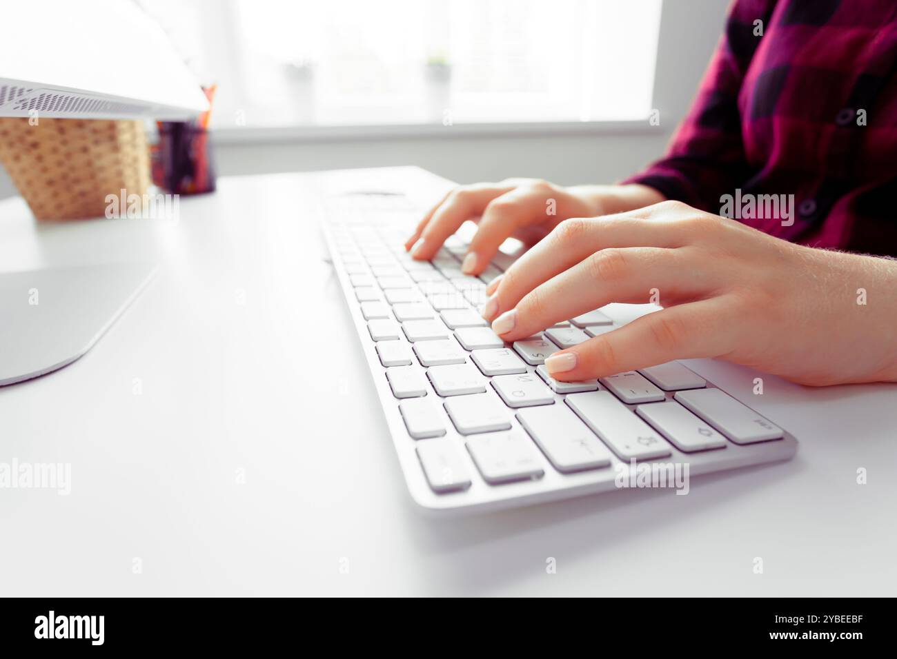 Hands of an office woman typing Stock Photo - Alamy