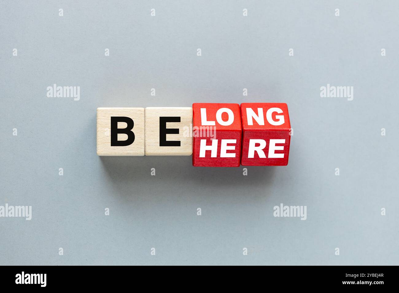 Here belong symbol. rotating dice changing the word "be here" to ...