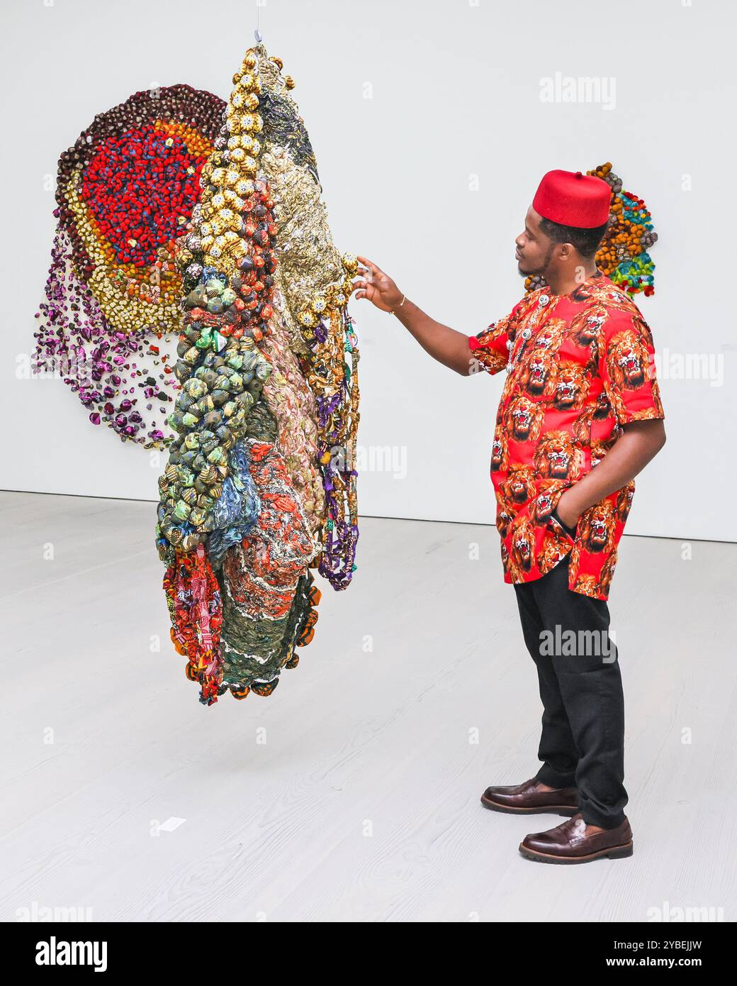 London, UK. 18th Oct, 2024. The artist with 'Droplets Becoming Fluid ...