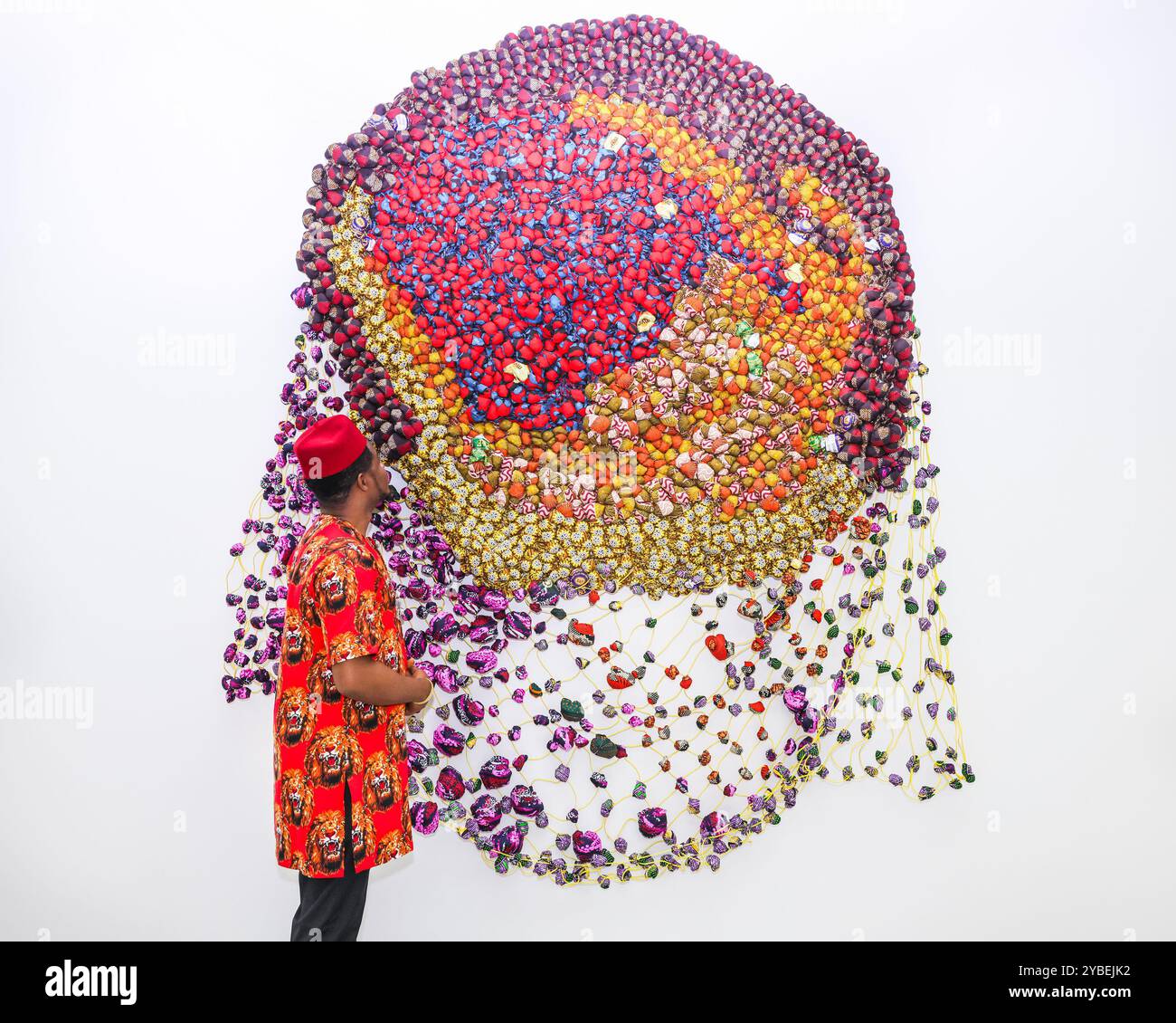London, UK. 18th Oct, 2024. The artist with 'Sunrise After Dusk', 2023 ...
