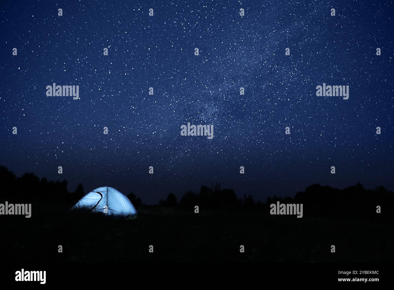 Modern camping tent in wilderness at night Stock Photo - Alamy