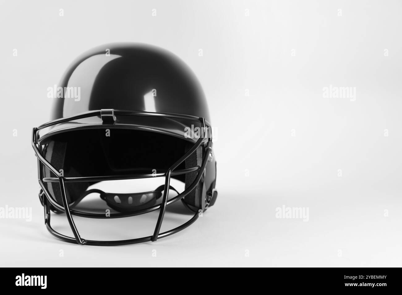 One black baseball helmet on white background, space for text Stock ...