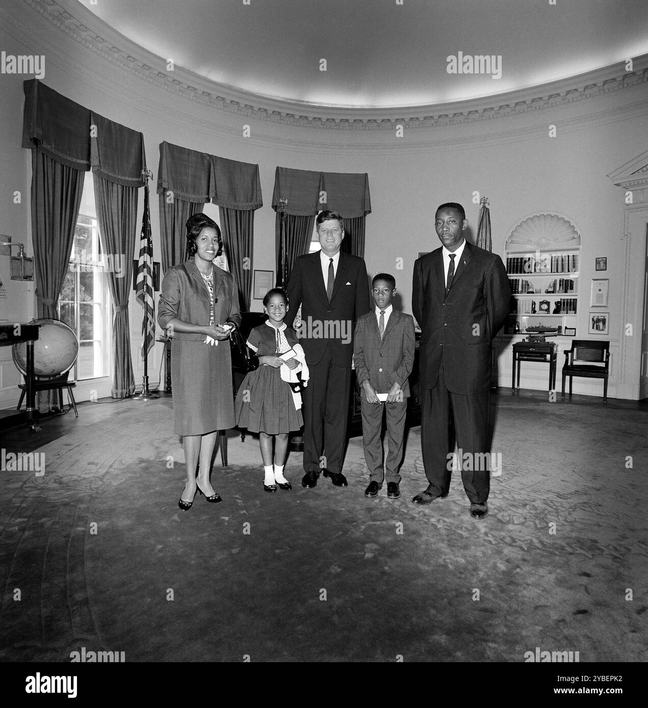 U.S. President John F. Kennedy (center) visiting with Myrlie Evers (far ...