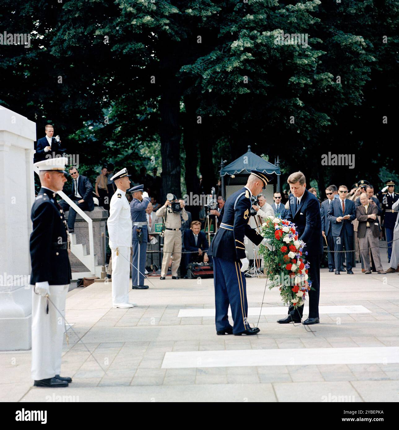 U.S. President John F. Kennedy placing wreath at Tomb of the Unknown ...