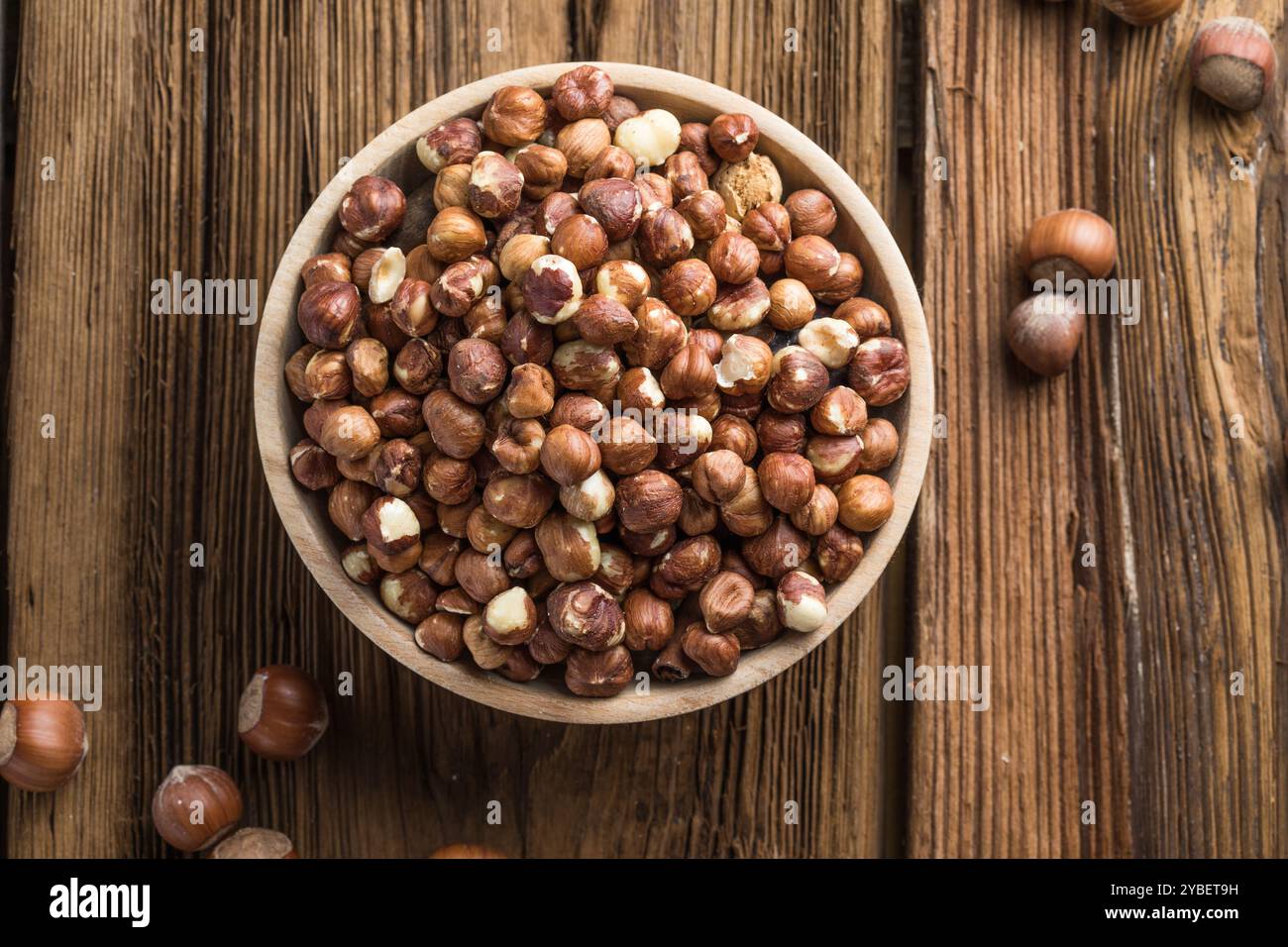 Full and peeled hazelnuts close-up. Macro photo of pile of filbert ...