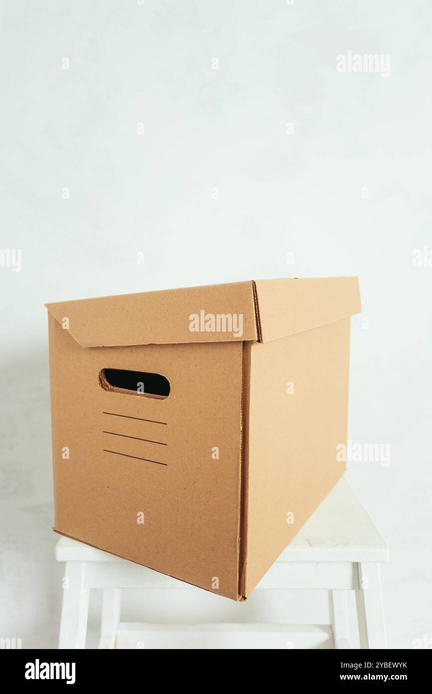 Big cardboard boxes standing insinde a room Stock Photo - Alamy