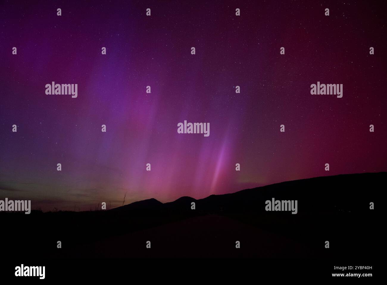 Northern lights above the Jura mountains in France during the solar ...