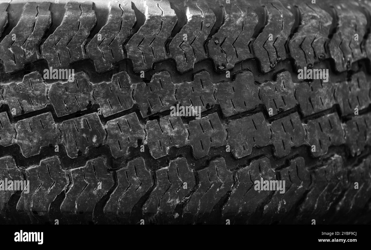 Used car tire protector pattern, close up background photo Stock Photo ...