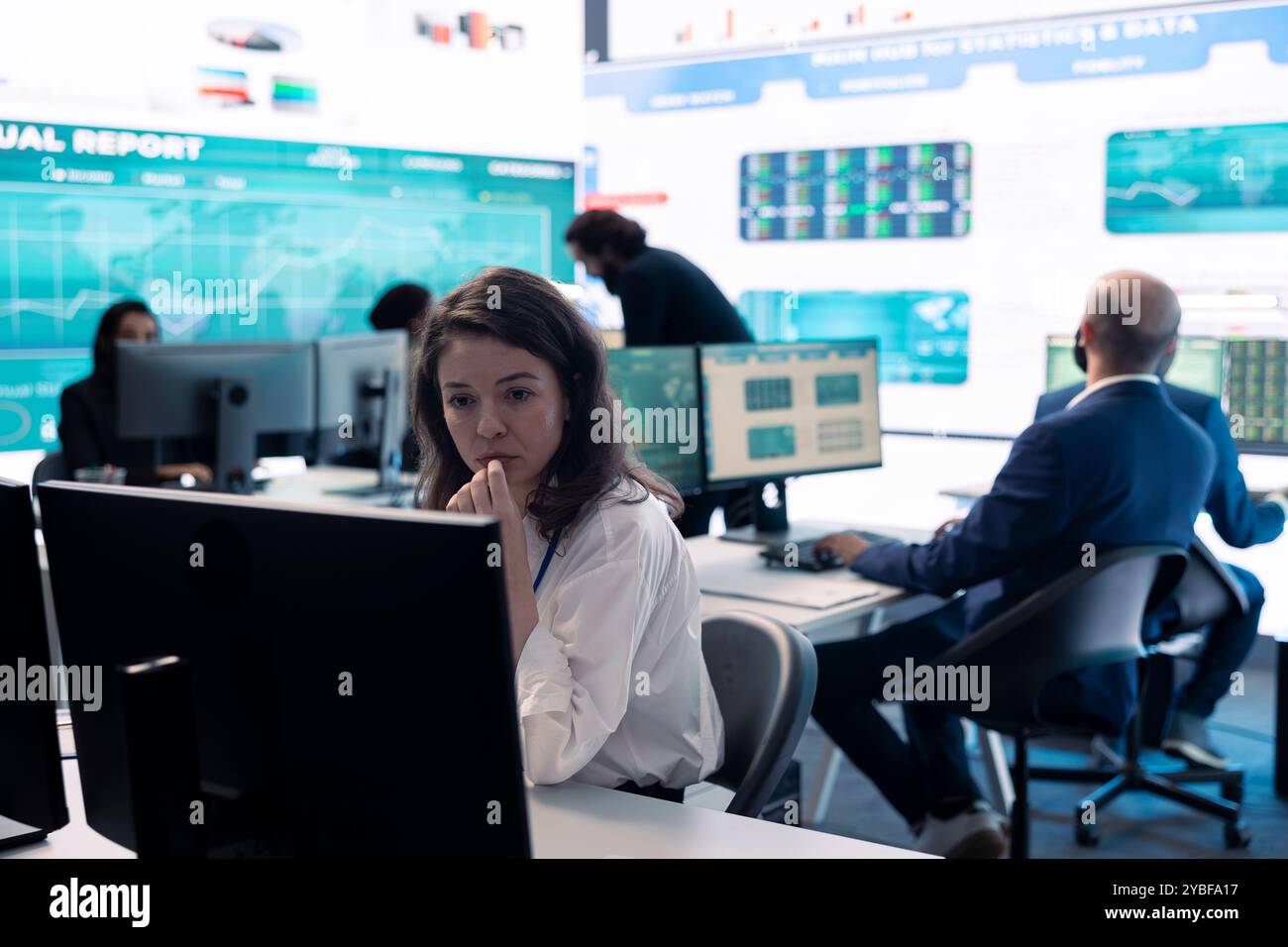 Project manager examining key performance metrics to ensure global ...