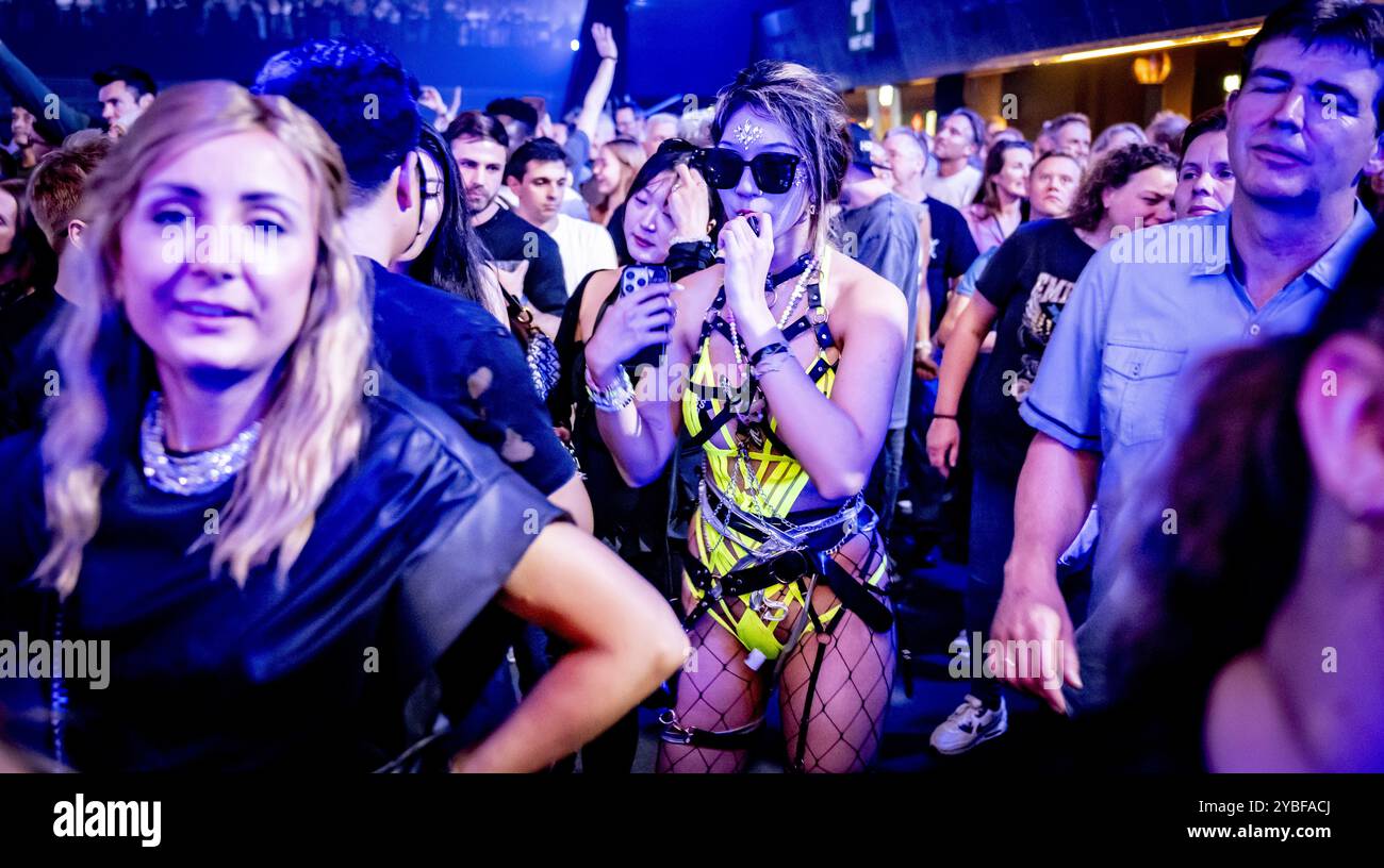 AMSTERDAM - Visitors during Tomorrowland's Our Story show. The dance ...
