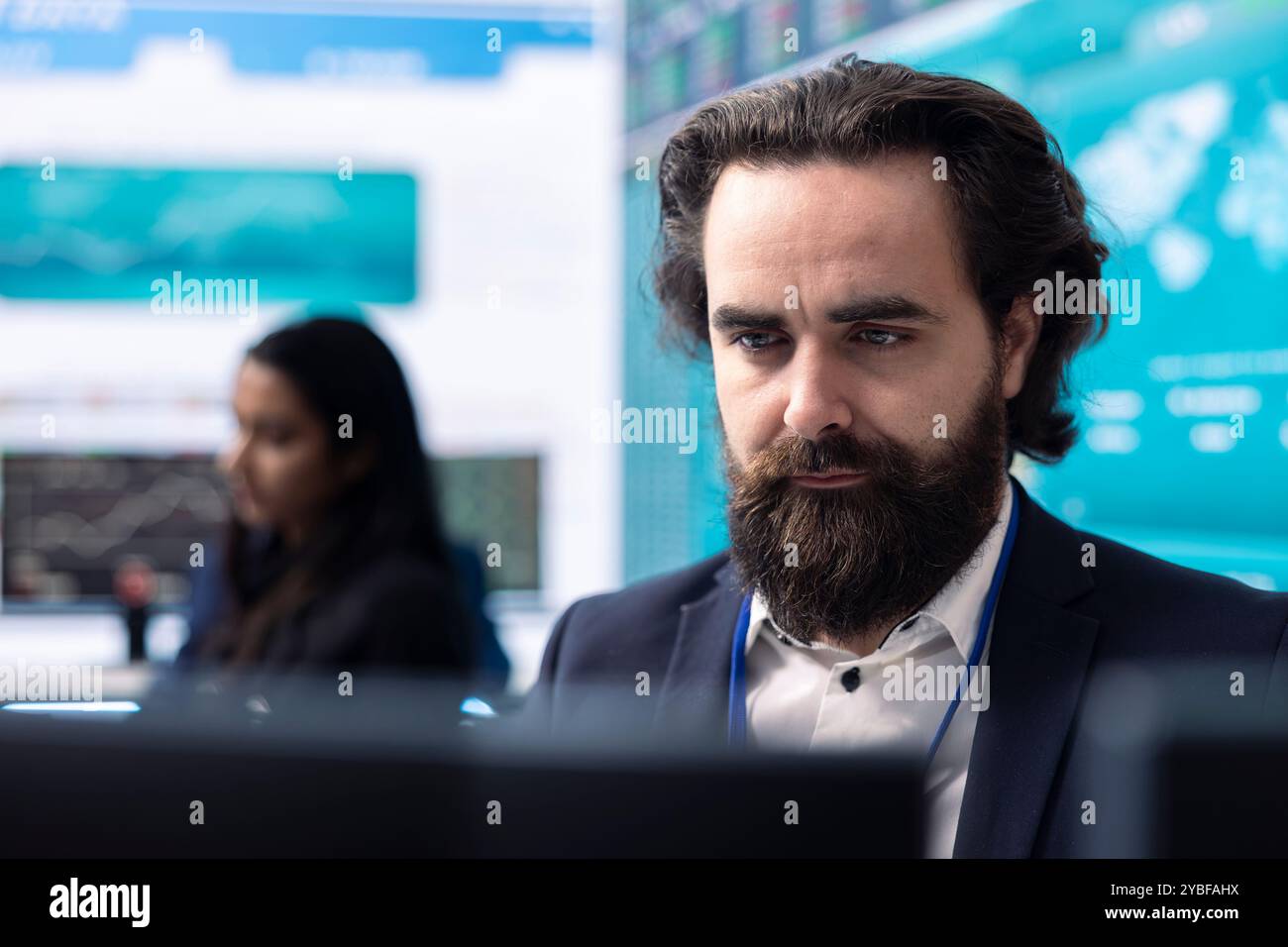 CEO reviewing business activity numbers on annual reports in control ...