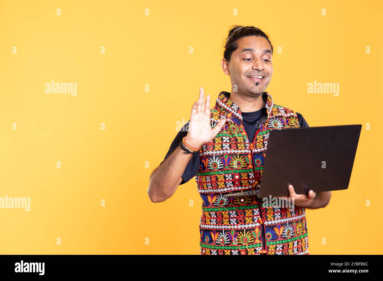 Radiant employee doing waving hand gesture, doing teamwork with ...