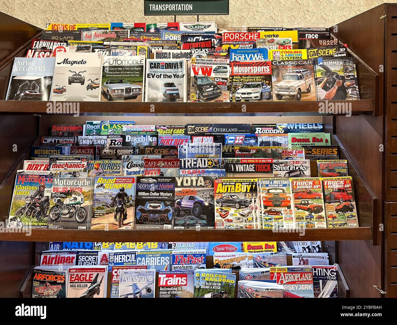 A view of auto, transportation, automotive, car magazines on display ...