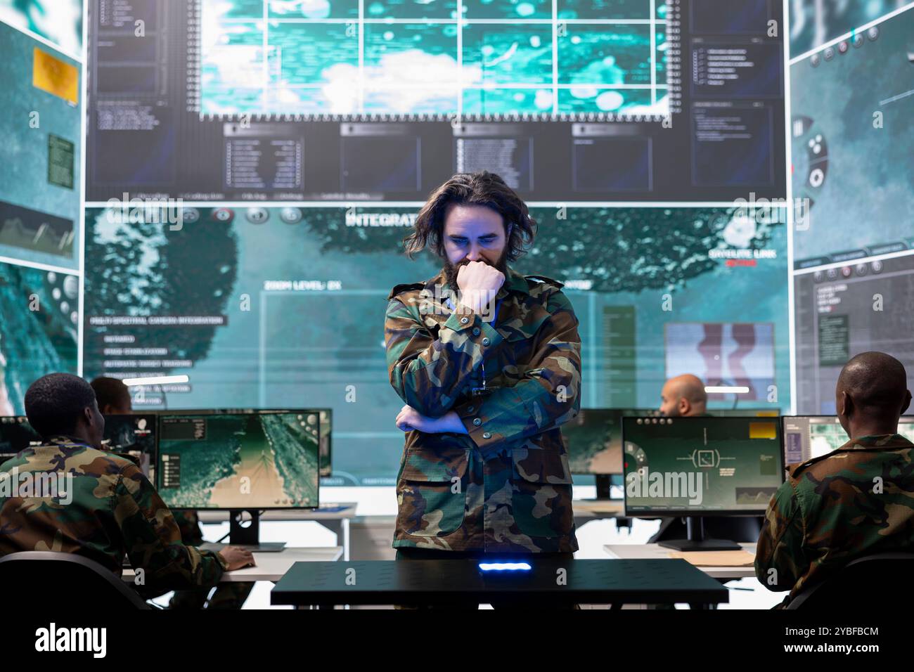 Young army conscript checking mission data and details on a hologram ...