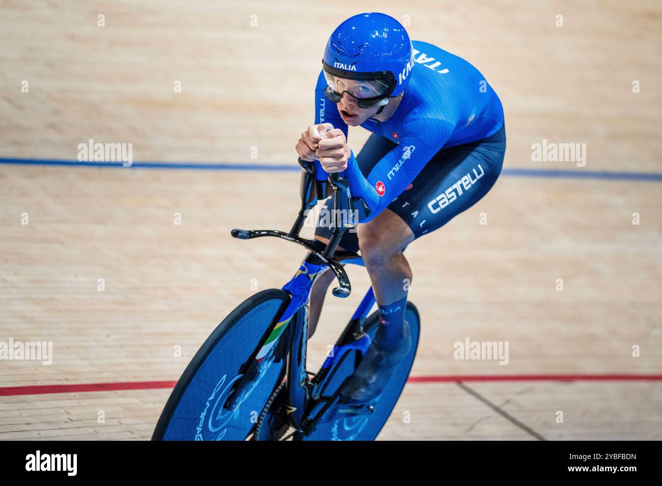 Italy' Jonathan Milan competes during the men's pursuit final at the ...