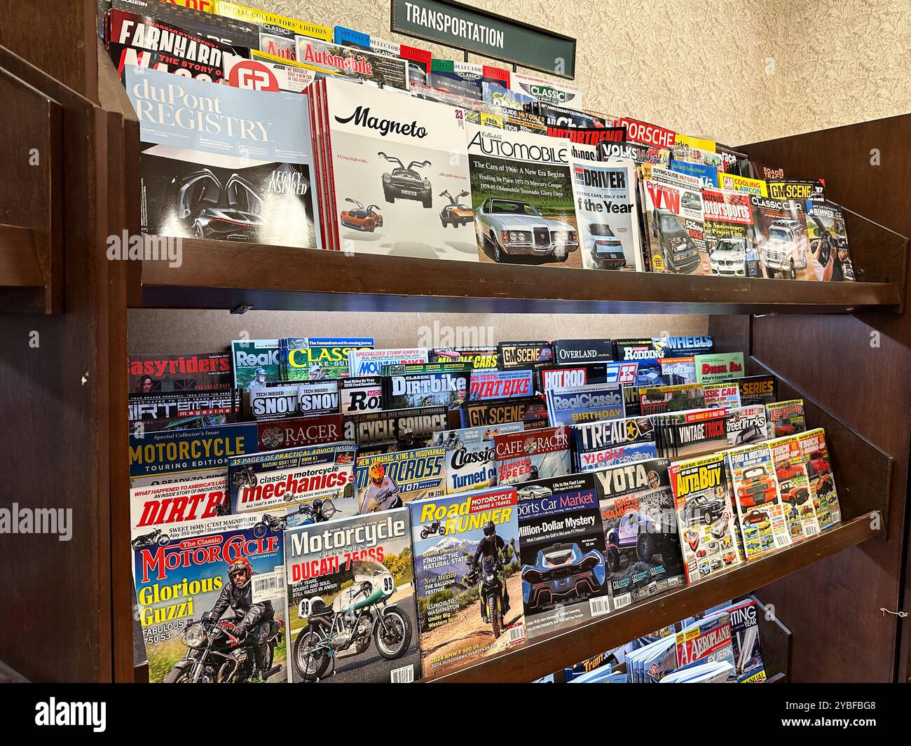 A view of auto, transportation, automotive, car magazines on display ...