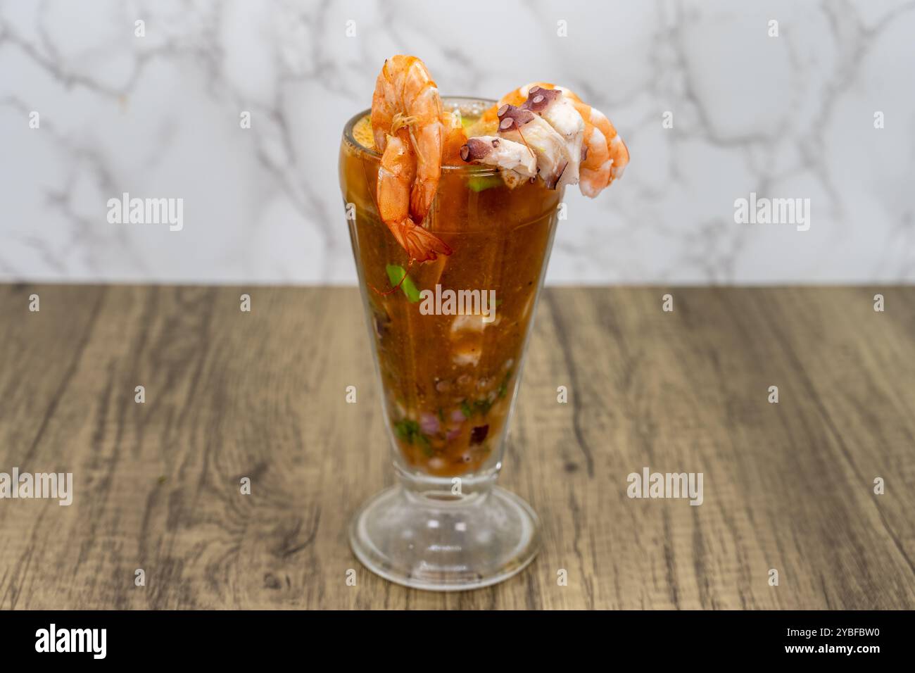 Delicious looking consome perron shrimp cocktail with octopus for a ...