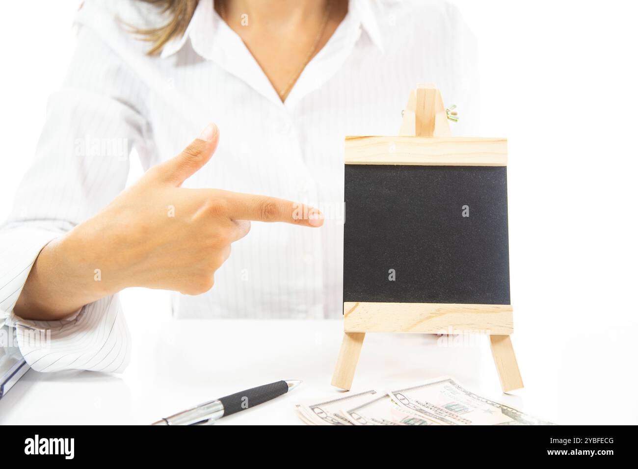 hand pointing at a blank chalkboard Stock Photo - Alamy