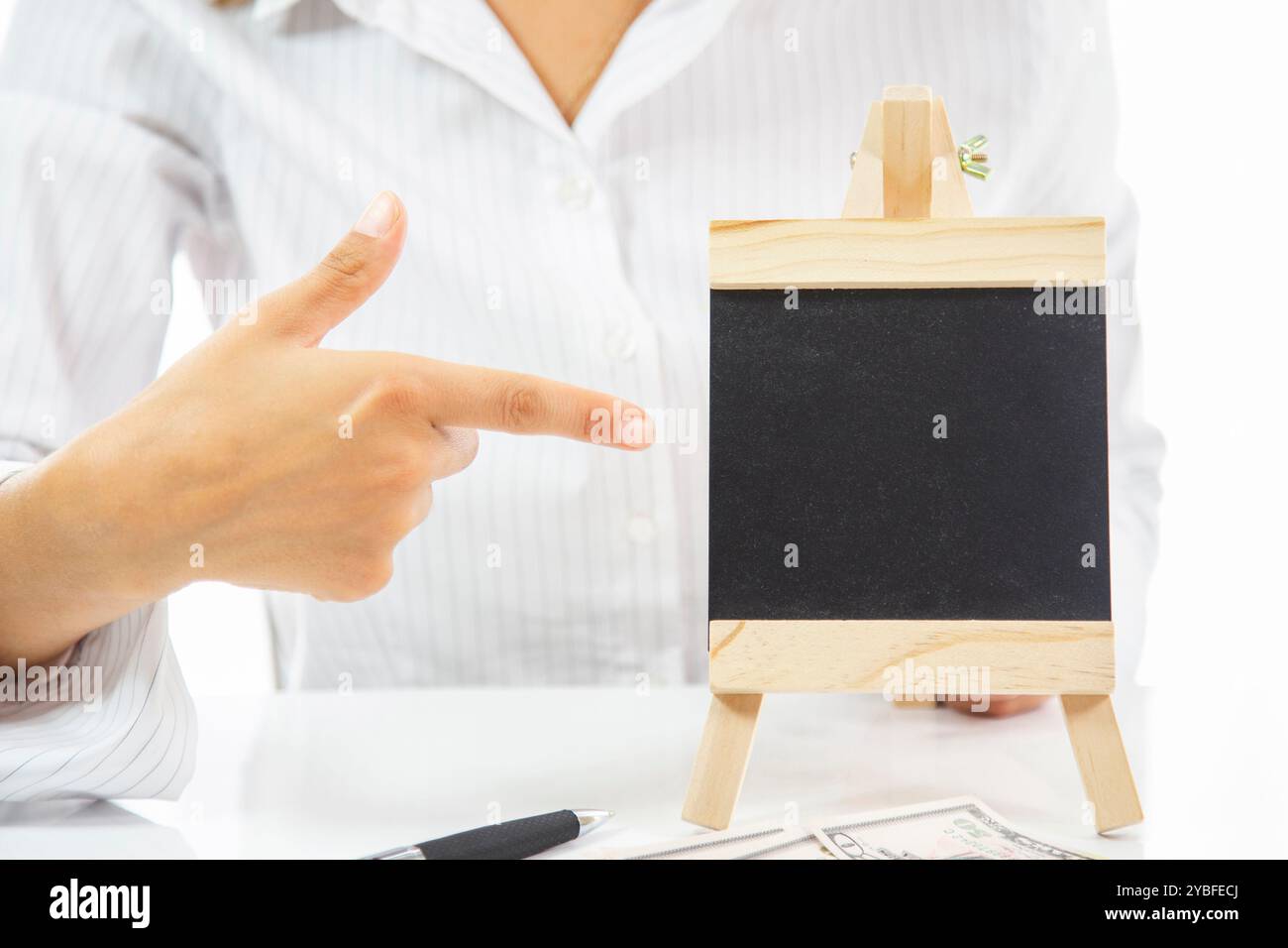 hand pointing at a blank chalkboard Stock Photo - Alamy