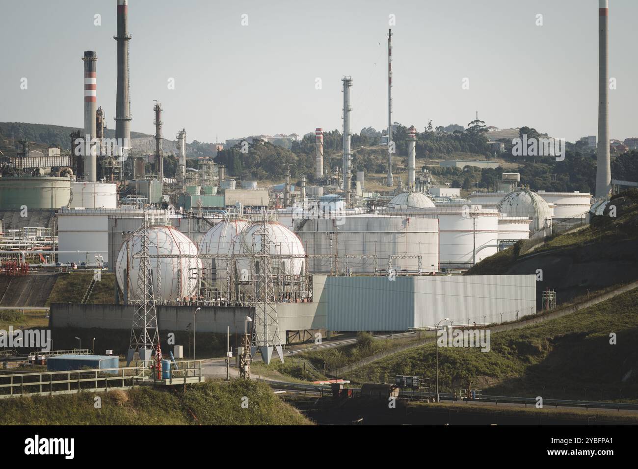 An extensive industrial oil refinery with large spherical and ...