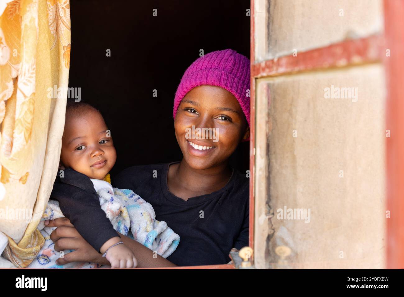 unexpected teenage pregnancy, village african family young mother with ...