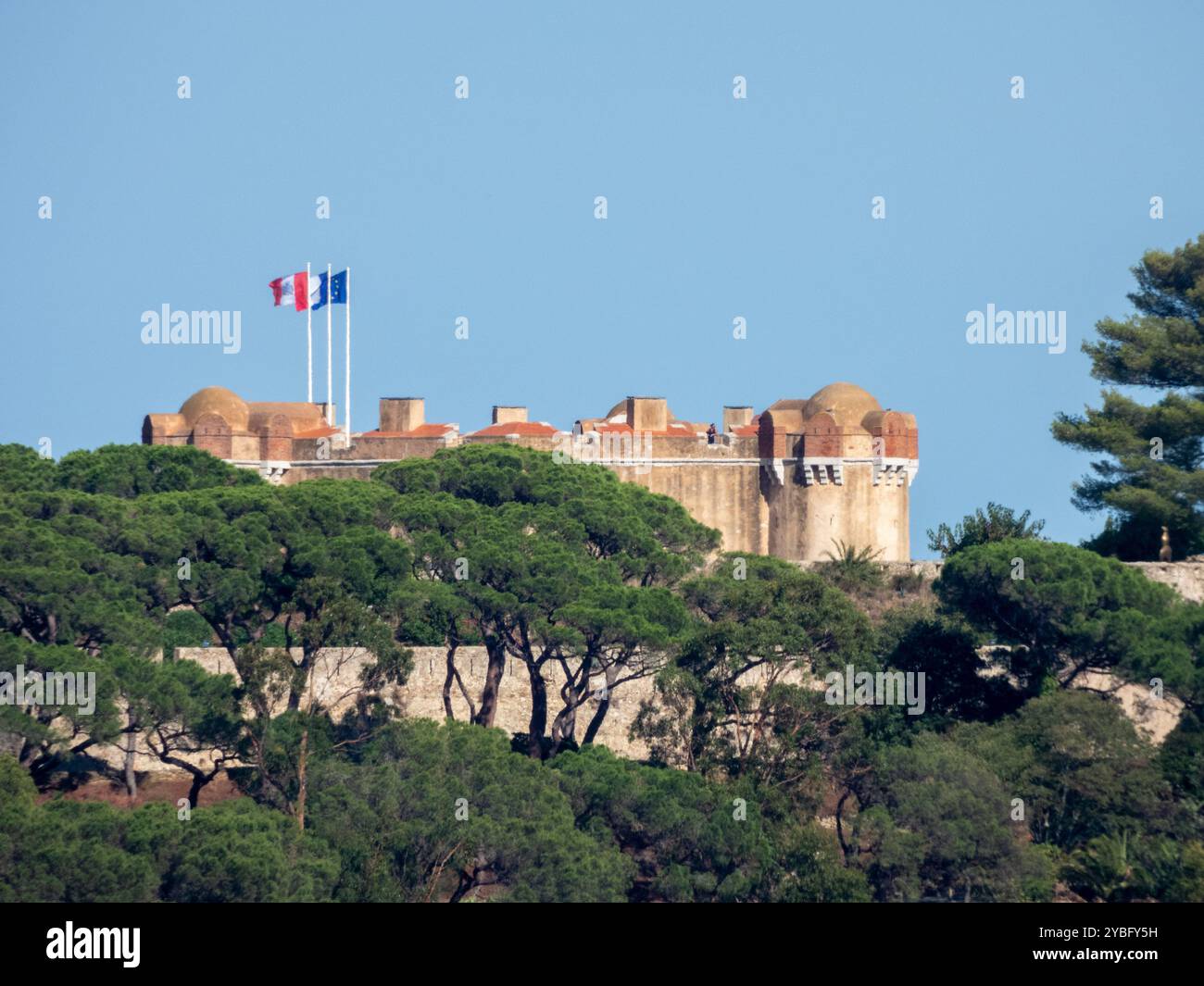 Saint-Tropez citadel Castle at the top of a hill with pines, in France ...